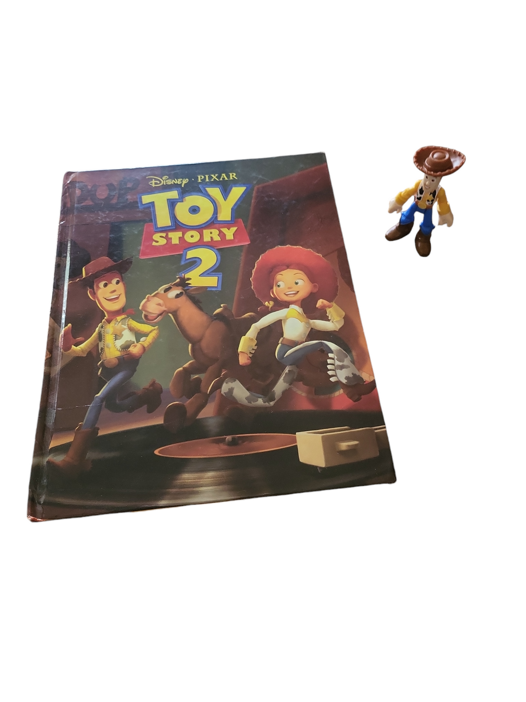 Ricochet Reading Room - Toy Story 2 Book with Woody Figure – Ricochet Kids